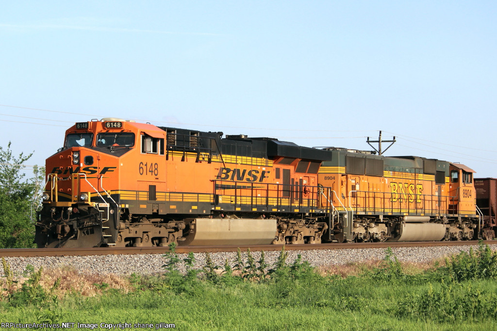 BNSF 6148 sits in the siding waiting for a derailment to clear up north,